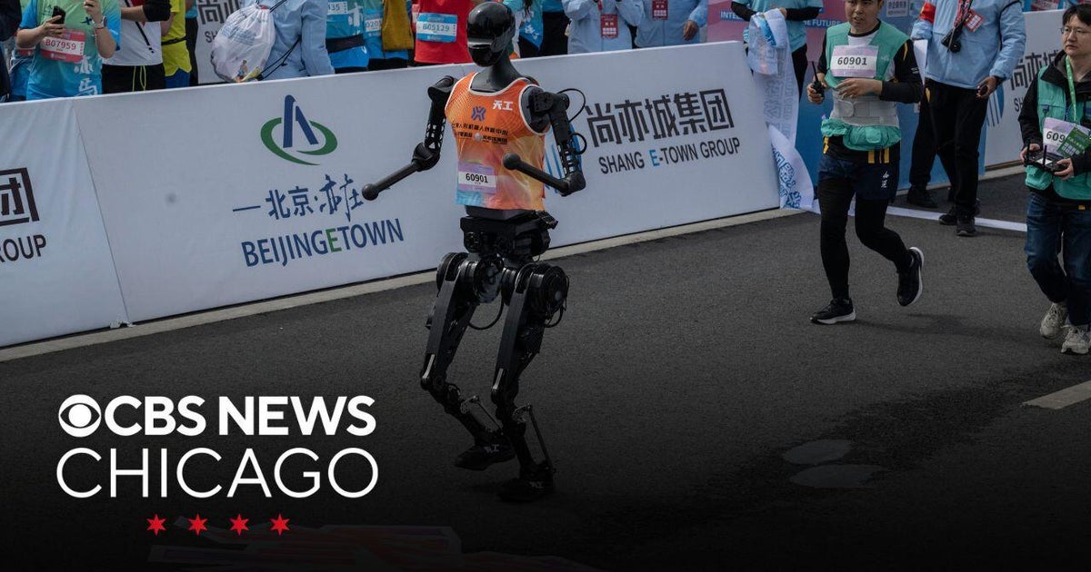 Robots run with humans at half marathon in Beijing - CBS Chicago