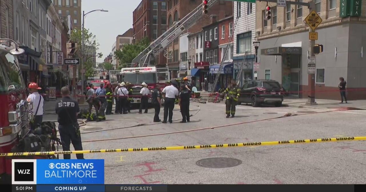 Baltimore firefighters injured battling rowhome fire - CBS Baltimore