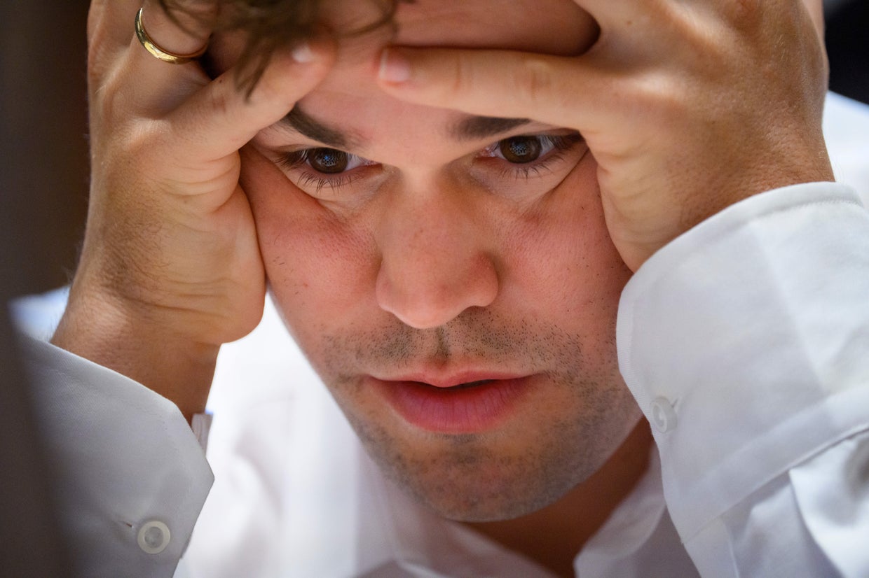 Chess grandmaster Magnus Carlsen forced into draw in showdown against ...