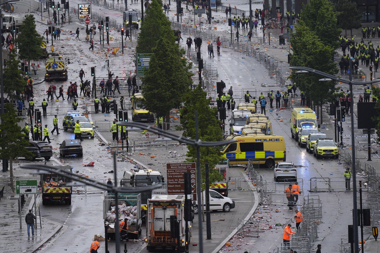 Man arrested after allegedly driving car into crowd at Liverpool FC ...