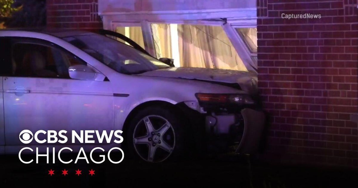 Shootout ends with car crashed into home; police searching for driver ...