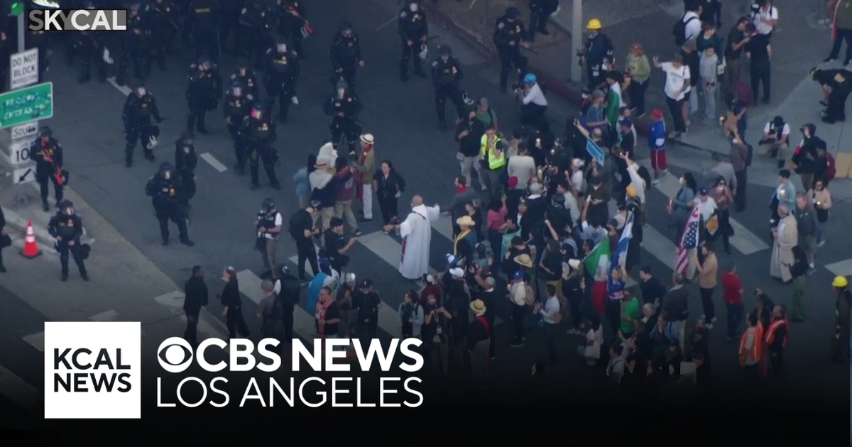 Downtown LA curfew goes into effect as protesters gather outside ...
