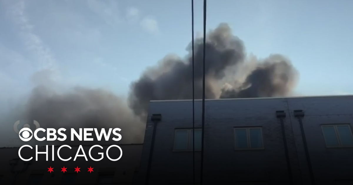Chicago firefighters battle fire at South Loop condo building - CBS Chicago