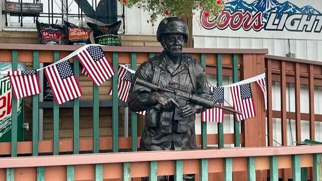 Stolen soldier statue returned to Rush Point Store; suspected thief ...