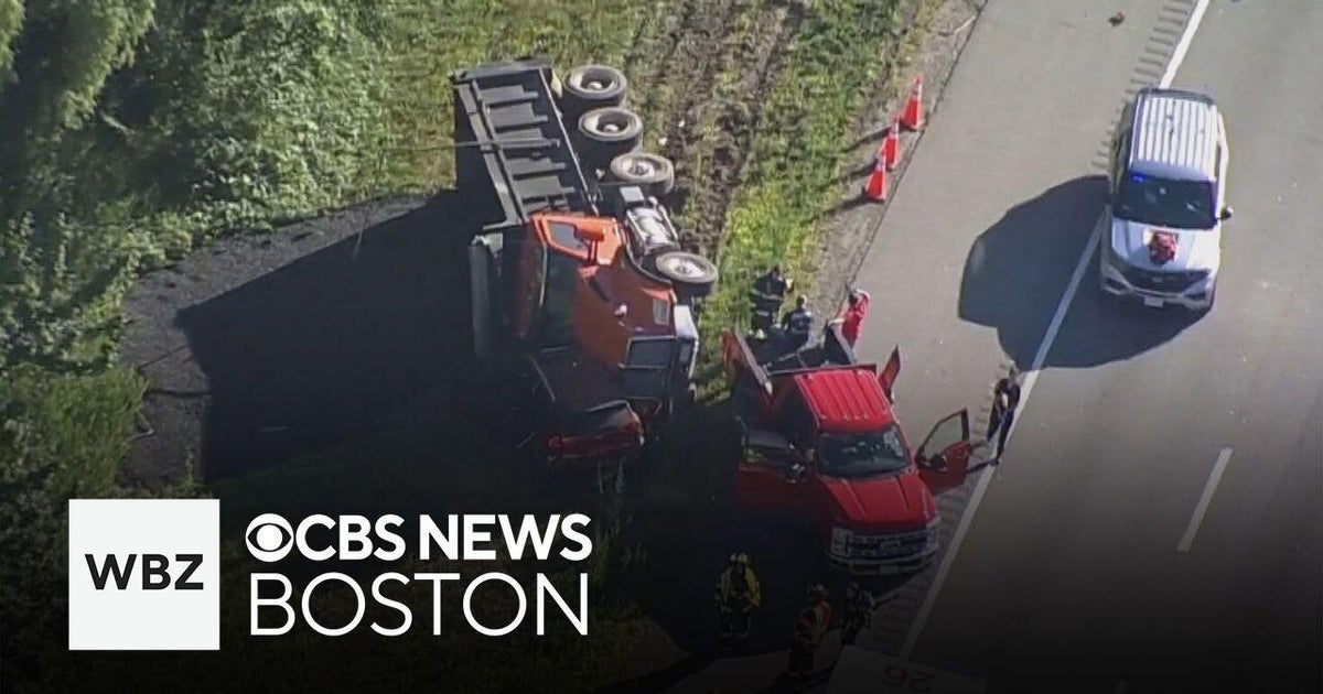 Dump truck carrying asphalt crashes on I-495 in Chelmsford, Massachusetts - CBS Boston