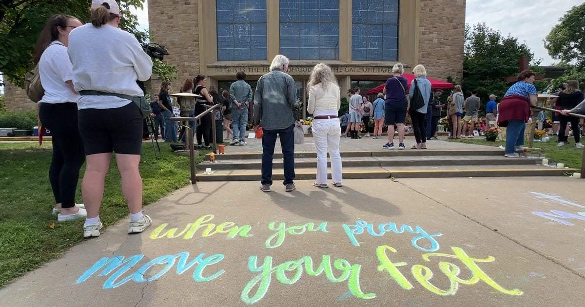 Hundreds visit Annunciation Church to pay tribute to victims of ...