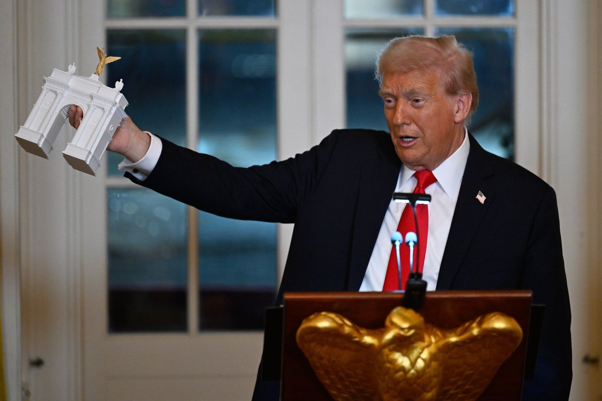Trump unveils model of triumphal arch to business titans at White House ...