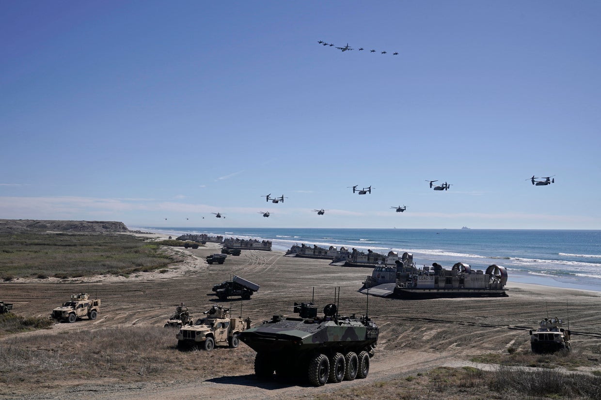 Patrol car struck by shrapnel from artillery round fired over I-5 from ...