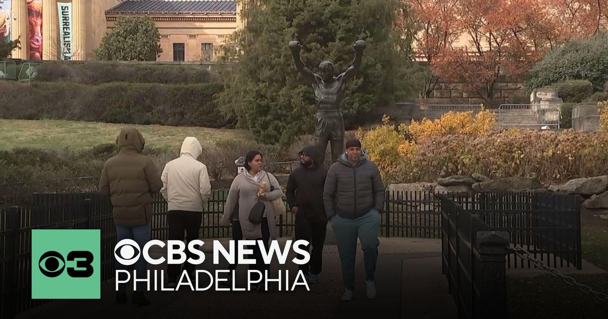 Philadelphia residents, visitors bundle up as cold and wind blast the ...