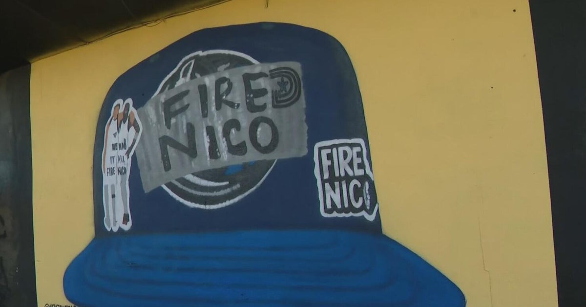 Dallas artist updates mural to "Fired Nico" - CBS Texas