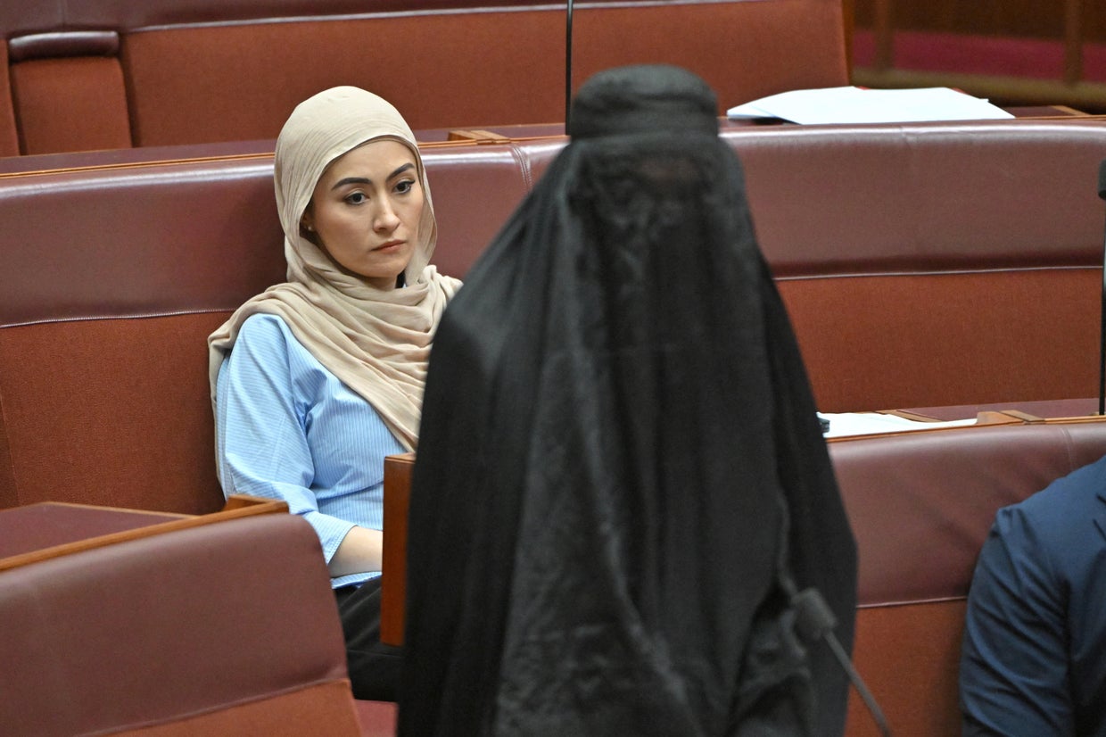 Australian far-right Senator Pauline Hanson slammed for wearing burqa to parliament to demand ...