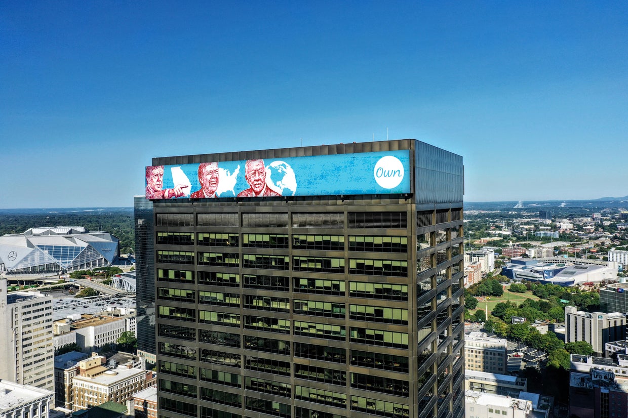 Jimmy Carter honored with towering mural lighting up downtown Atlanta ...