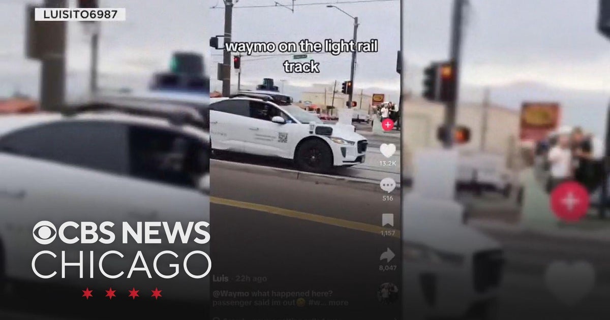 Waymo car drives down light rail tracks in Phoenix - CBS Chicago