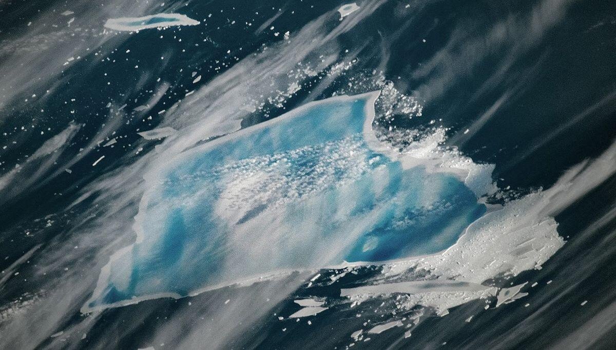 Massive iconic iceberg turns blue and is "on the verge of complete ...