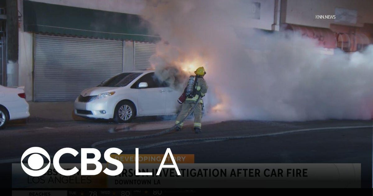 Investigators looking into arsonist starting downtown LA car fire - CBS ...
