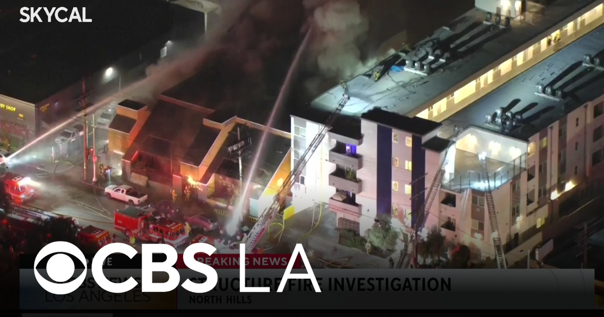 Fire at boarded-up building threatens North Hills apartments; residents ...