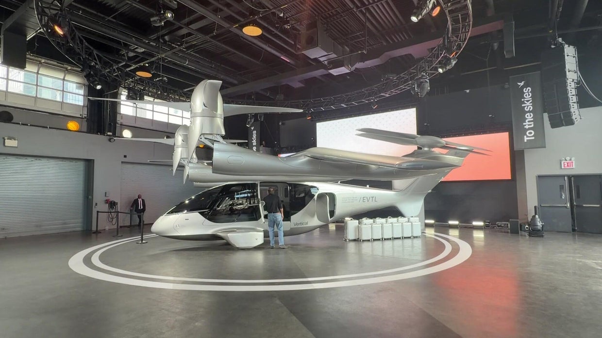 Electric air taxi offers NYC a glimpse of the future of travel - CBS ...
