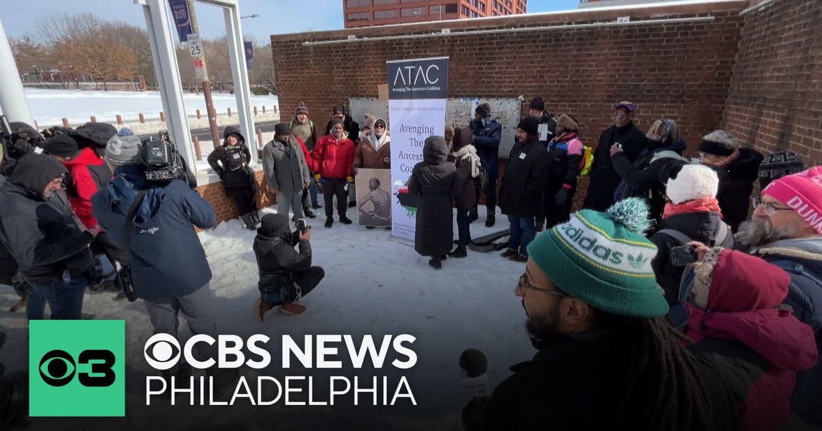 Community members gather to protest removal of slavery exhibit in ...