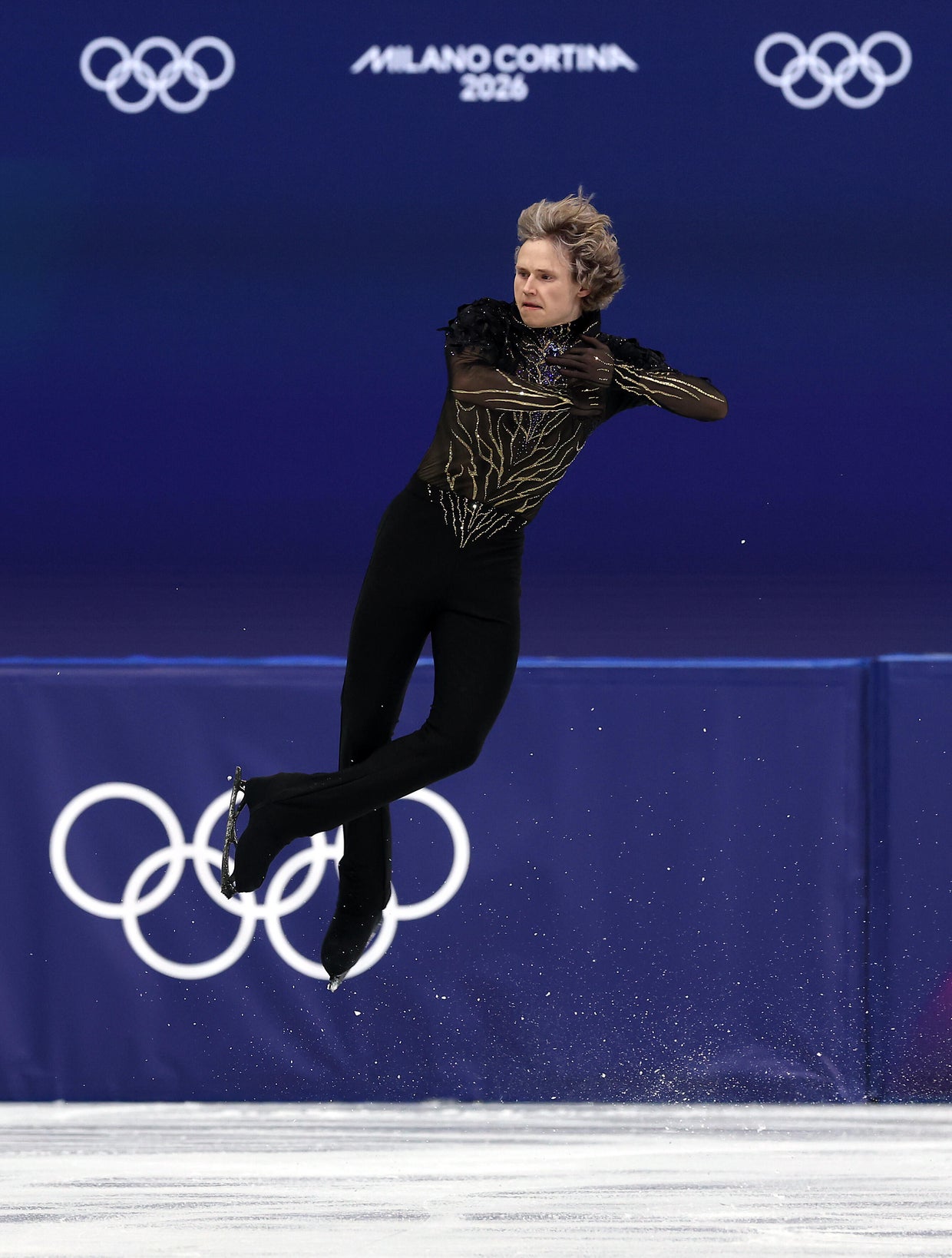 The evolution of the quad, ice skating's most daring jump - CBS News