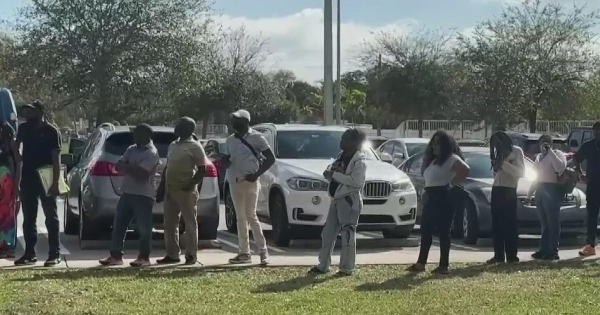Hundreds of Haitian TPS holders line up in North Miami for driver’s ...