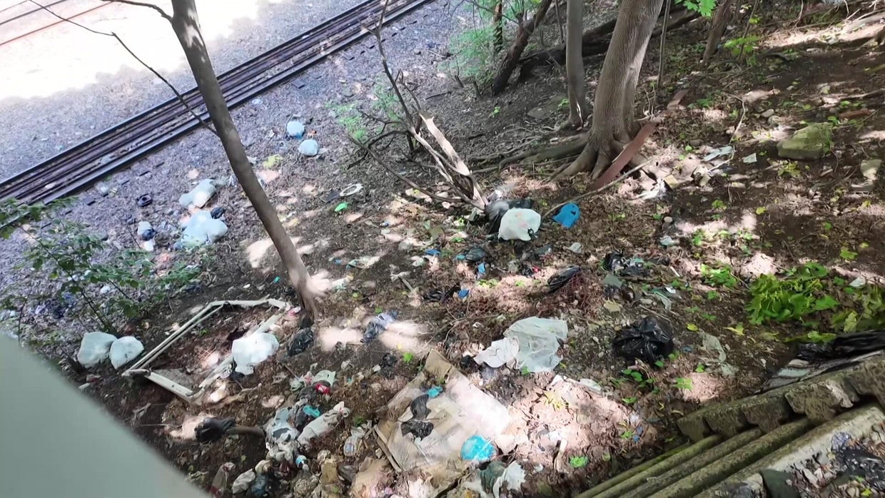 Maspeth residents fed up with piles of garbage along freight train ...